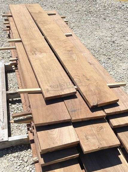 Group of 1" thick rough sawn walnut lumber - Schneider Auctioneers LLC