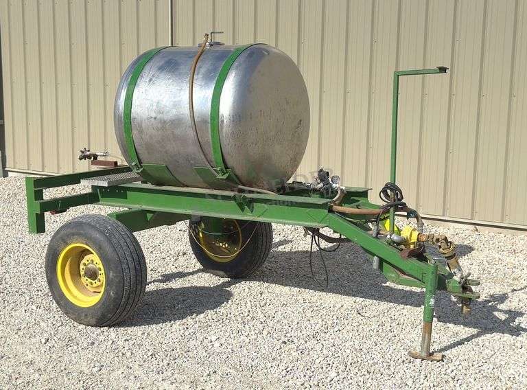 Homemade pull type sprayer w/ boomless nozzle - Schneider Auctioneers LLC