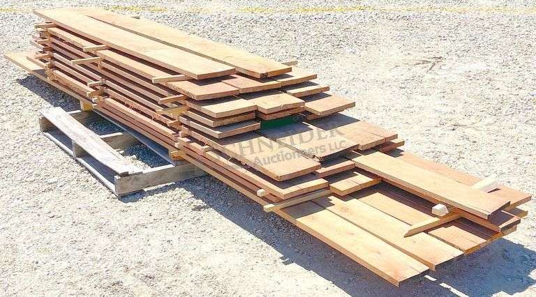 Group of 1" thick rough sawn walnut lumber - Schneider Auctioneers LLC