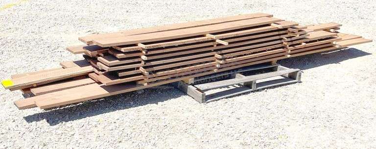Group of 1" thick rough sawn walnut lumber - Schneider Auctioneers LLC