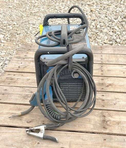 Miller 141 mig welder, 110 volts - Schneider Auctioneers LLC