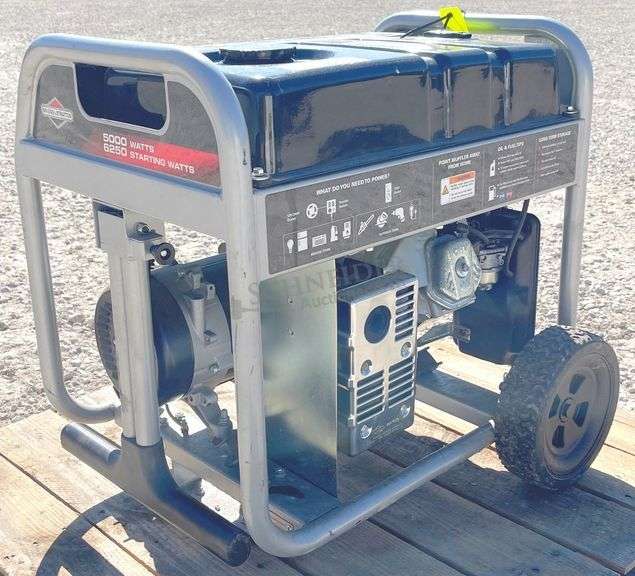 5,000 watt portable generator w/ Briggs engine - Schneider Auctioneers LLC