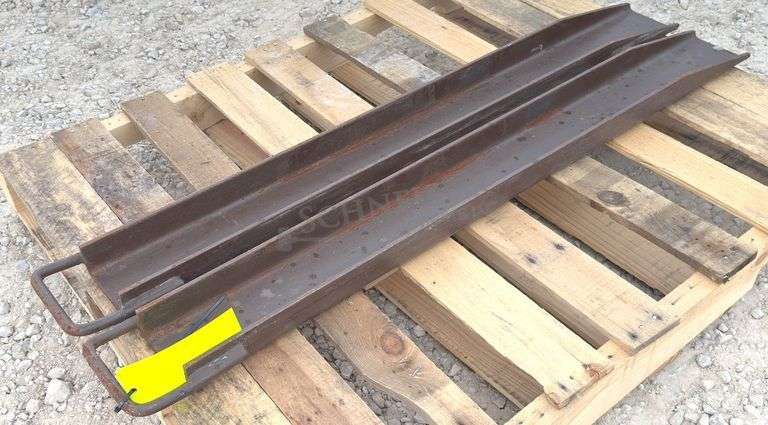 Pair of 4' fork extensions - Schneider Auctioneers LLC