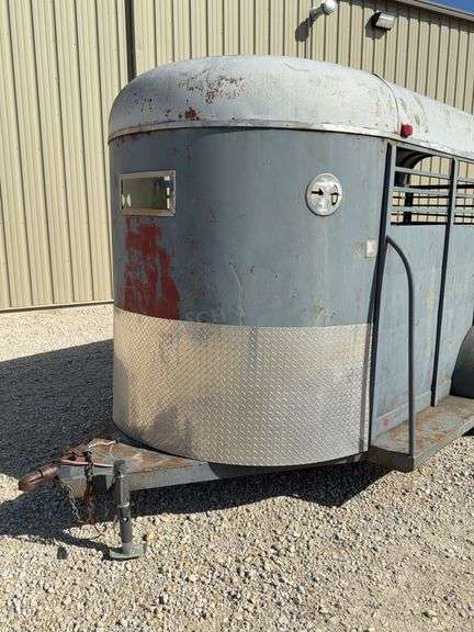 1976 SNCT 16' stock trailer - Schneider Auctioneers LLC