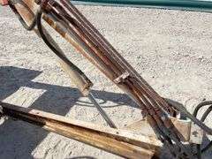 Loader w/ brackets off of a Case tractor - Schneider Auctioneers LLC