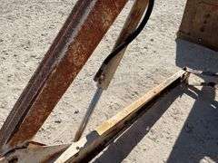 Loader w/ brackets off of a Case tractor - Schneider Auctioneers LLC