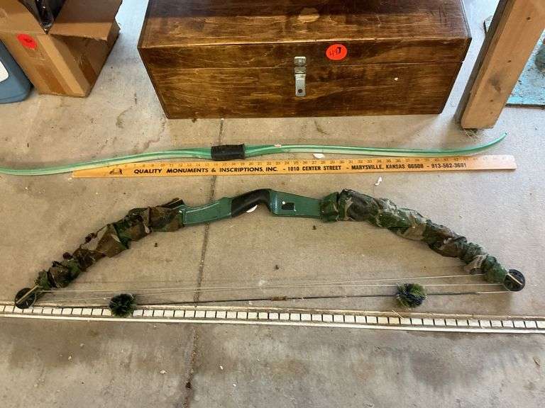 One compound bow with camo sleeves, one fiberglass bow - SCHULTIS & SON ...