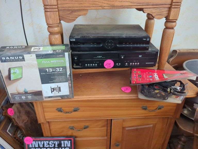 DirecTV receiver- VHS and DVD player- Sanus TV wallmount- HDMI cords ...