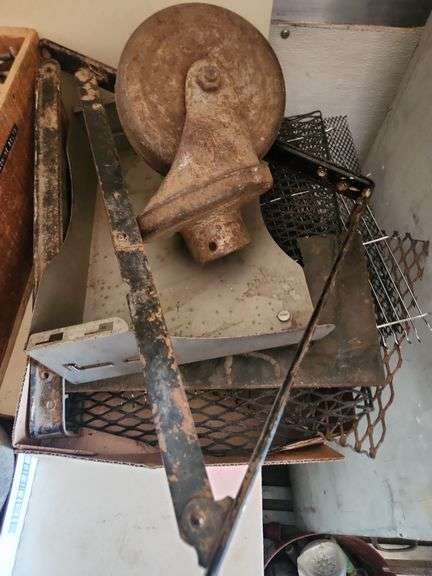 Large caster, shelf bracket, miscellaneous. Bolts and grinding wheels ...
