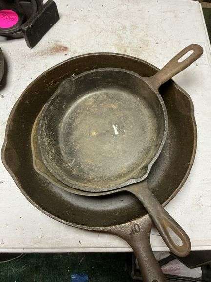 Three cast-iron skillets 11 inch and number eight - SCHULTIS & SON, INC.