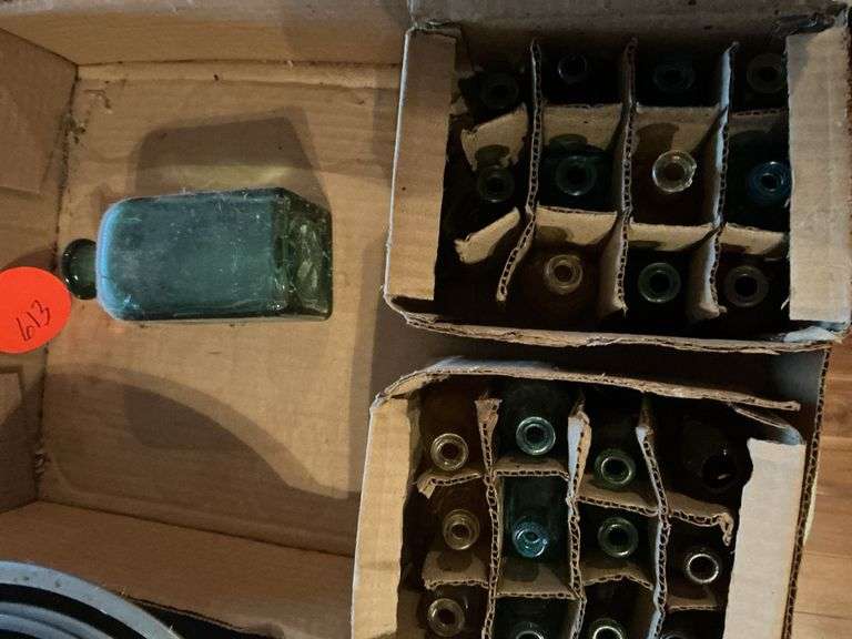 Medicine bottle and couple dozen little mini bottles - SCHULTIS & SON, INC.