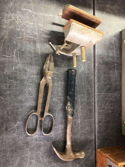 Level, vise, snips, and hammer - SCHULTIS & SON, INC.