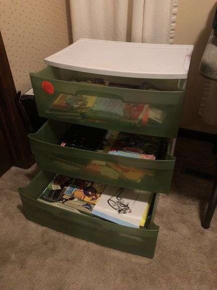 Plastic drawers with books - SCHULTIS & SON, INC.