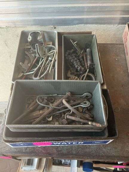 Bread pans with random metal pieces - SCHULTIS & SON, INC.
