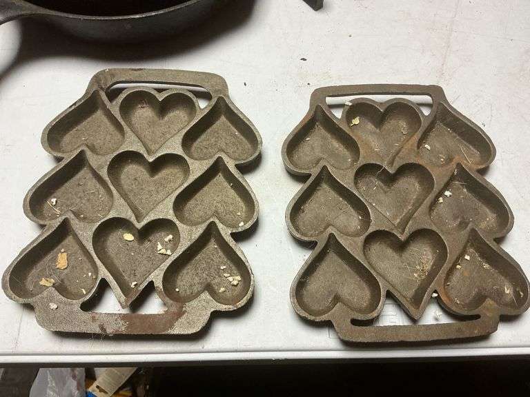 Two cast-iron heart pans - SCHULTIS & SON, INC.