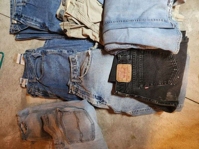 lots of jeans, Levi's, wranglers, carhart, etc 2 or 3 jeans have holes ...
