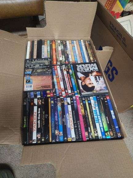 100s of dvd's all in box - SCHULTIS & SON, INC.
