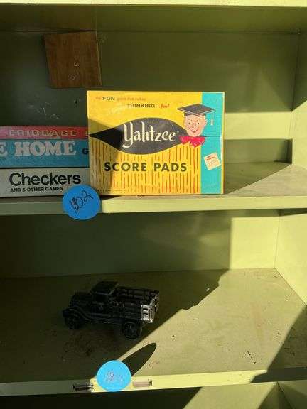 Checkers Snoopy come home, cribbage board, and Yahtzee score pads ...