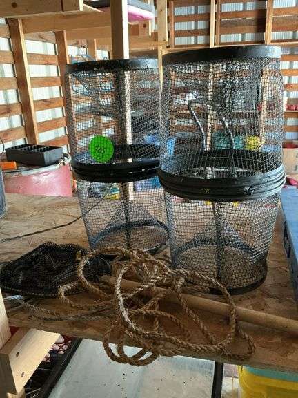 two minnow traps and a small fishing net - SCHULTIS & SON, INC.