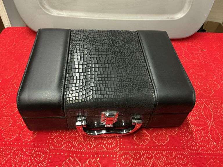 Trunk, suitcase and jewelry cases - SCHULTIS & SON, INC.