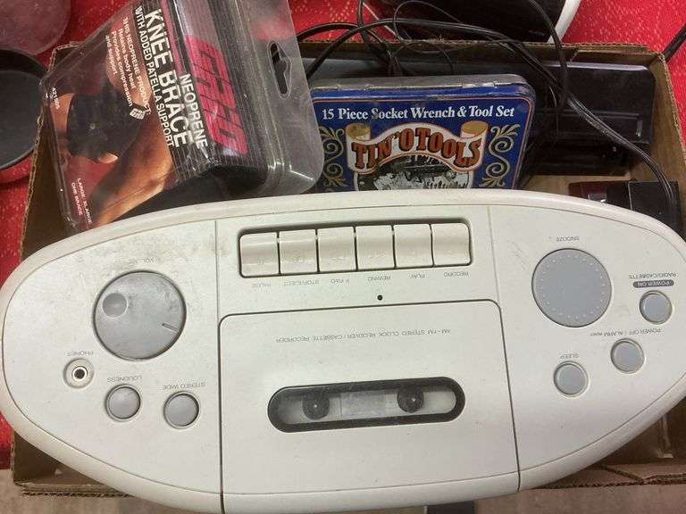 Radio, tools tin, knee brace hole punch - SCHULTIS & SON, INC.