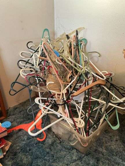 Large bunch of plastic hangers - SCHULTIS & SON, INC.