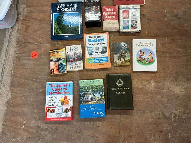 Variety of hardback and paperback books - SCHULTIS & SON, INC.