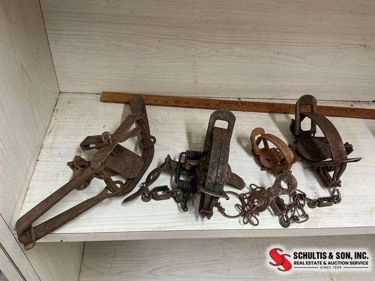 Rusty Steel Animal Traps - SCHULTIS & SON, INC.