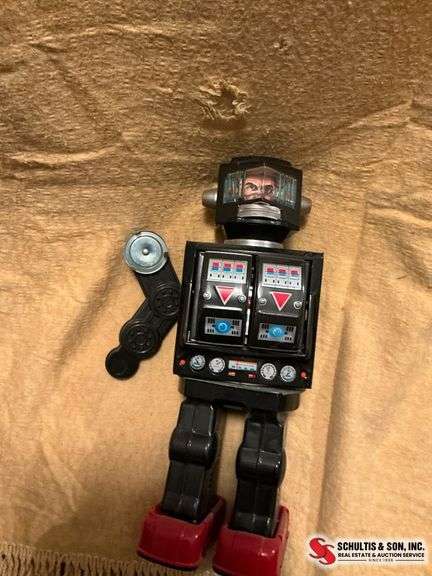 Plastic Robot Toy with Missing Arm - SCHULTIS & SON, INC.