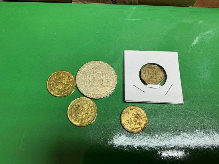 Five tokens - SCHULTIS & SON, INC.