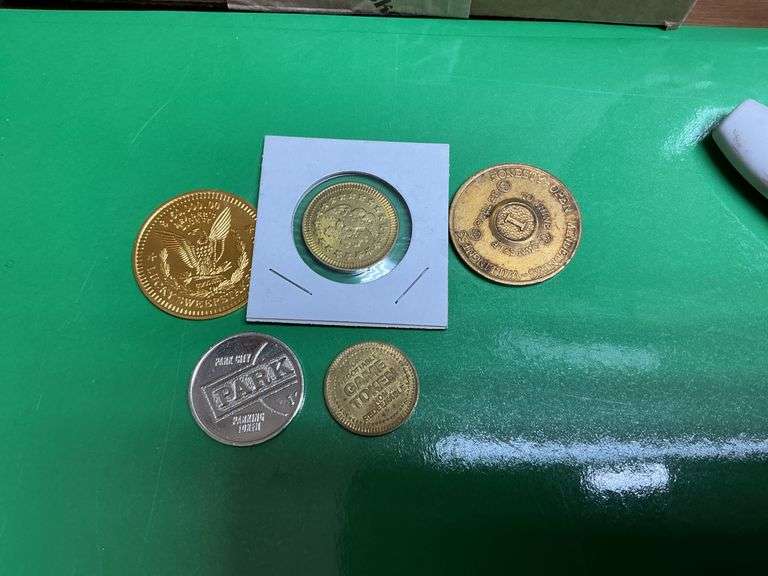 Five tokens - SCHULTIS & SON, INC.