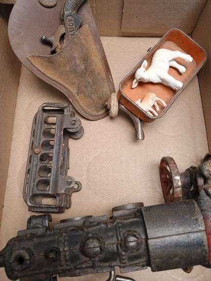 Vintage metal toys including pluck toy gun - SCHULTIS & SON, INC.