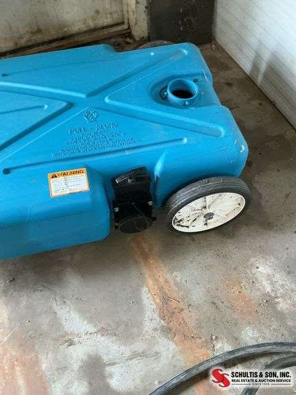 Fluid caddy on wheels with hand pump - SCHULTIS & SON, INC.