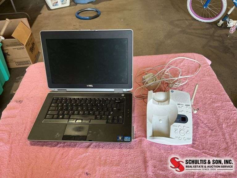 Cordless telephone base and laptop - SCHULTIS & SON, INC.