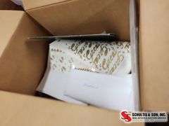 box full of stickers more in box - SCHULTIS & SON, INC.