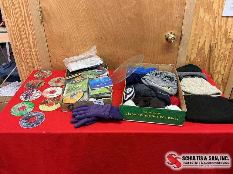 box of gloves and stocking hats- collection of CDs - SCHULTIS & SON, INC.