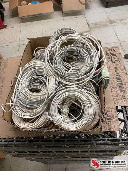 Rolls of small copper wire - SCHULTIS & SON, INC.