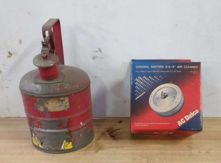 Metal Gas Can and Air Cleaner - Sherwood Auctions
