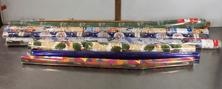 7 Rolls Of Wrapping Paper - Sherwood Auctions