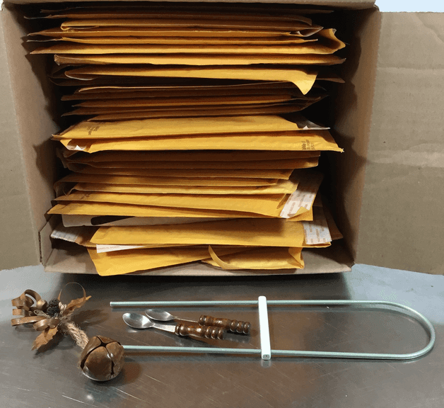 Box Of Padded Envelopes, Mini Silverware, Bell and More - Sherwood Auctions