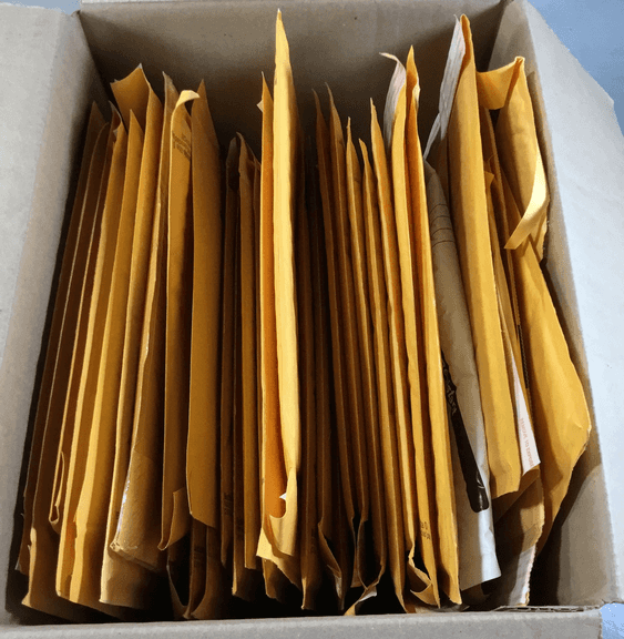 Box Of Padded Envelopes, Mini Silverware, Bell and More - Sherwood Auctions