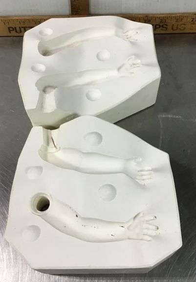 Doll Head and Arm Molds - Sherwood Auctions