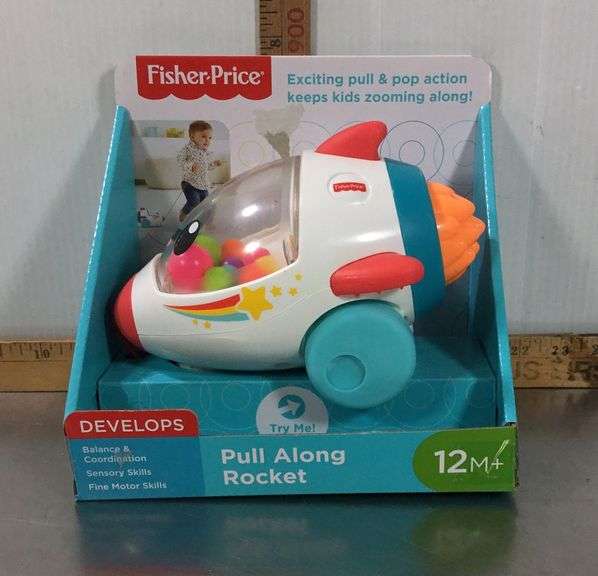 Fisher Price Pull Along Rocket - Sherwood Auctions