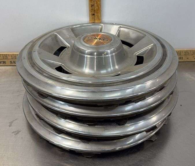 1969 Pontiac 14” PMD Hubcaps - Sherwood Auctions