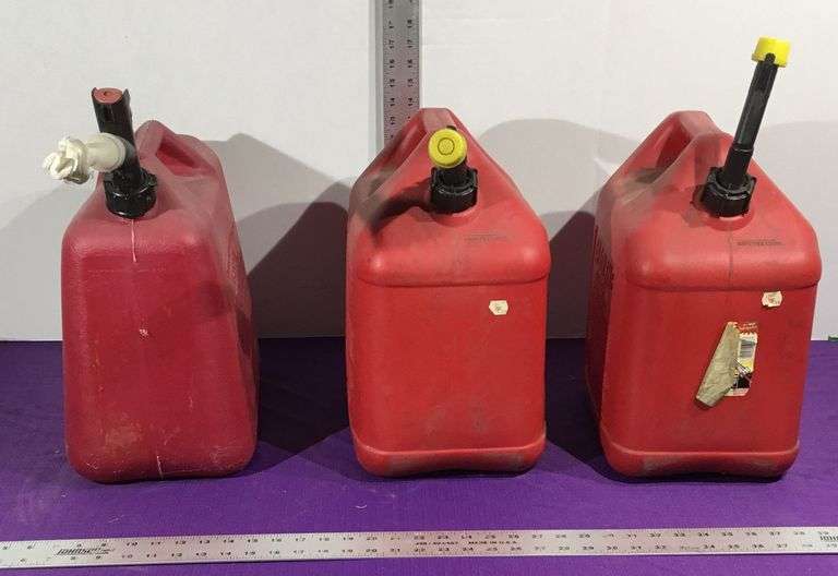 Three 5 Gallon Plastic Fuel Cans - Sherwood Auctions