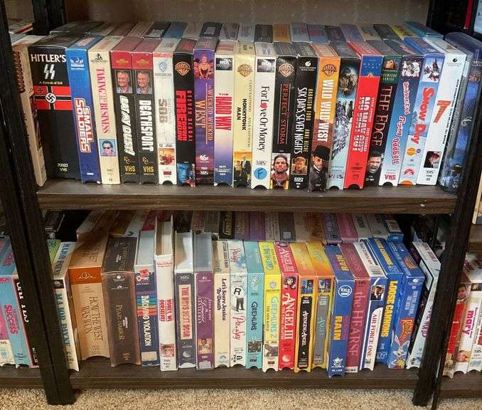 61”x25”x10” Bookshelf & Large Collection of VHS Tapes - Sherwood Auctions