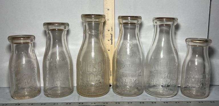 Six Milk Bottles from Various Michigan Dairies - Sherwood Auctions