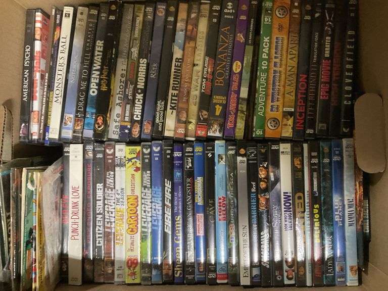 Box of DVDs & VHS Tapes - Sherwood Auctions