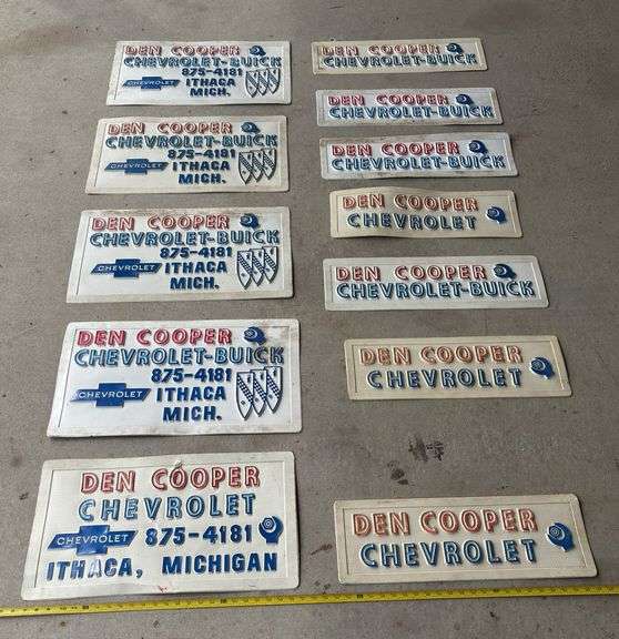 Den Cooper Chevrolet-Buick Signs - Sherwood Auctions