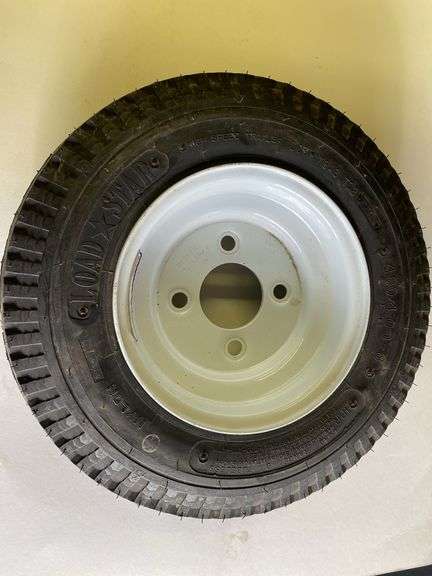 Martin Wheel with Load Star Tire (NEW) - Sherwood Auctions